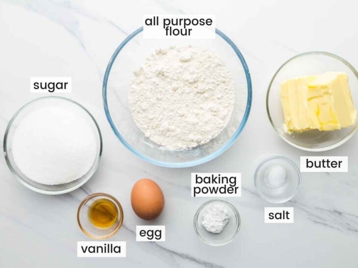 Easy Fruit Pizza (With Sugar Cookie Base and Cream Cheese Frosting!)